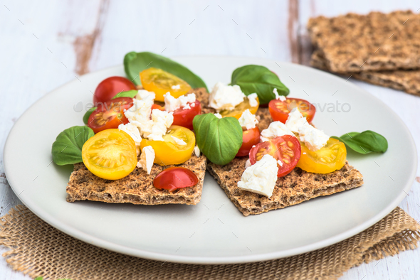 Healthy Snack from Wholegrain Rye Crispbread Crackers Stock Photo by Manuta