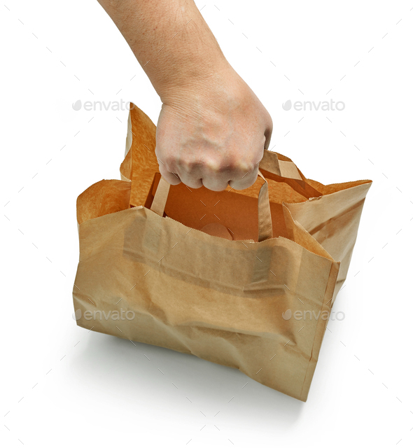 paper bag in human hand Stock Photo by magone | PhotoDune