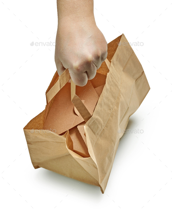 paper bag in human hand Stock Photo by magone | PhotoDune