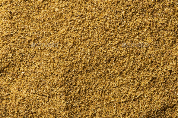 Texture of Cumin powder close-up, spice or seasoning as background ...