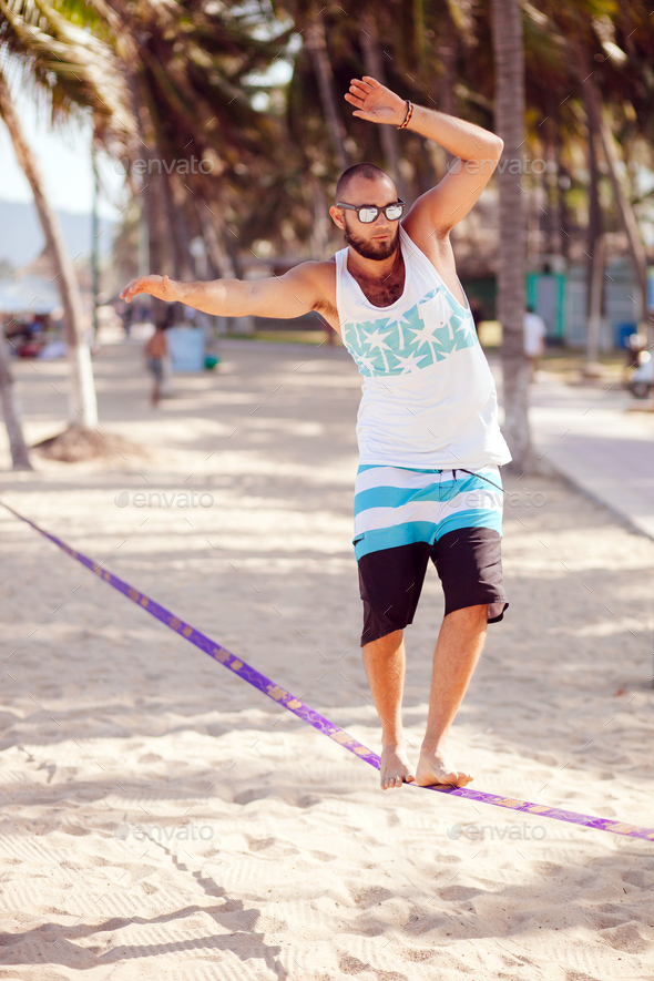 man balancing on the rope Stock Photo by avanti_photo | PhotoDune