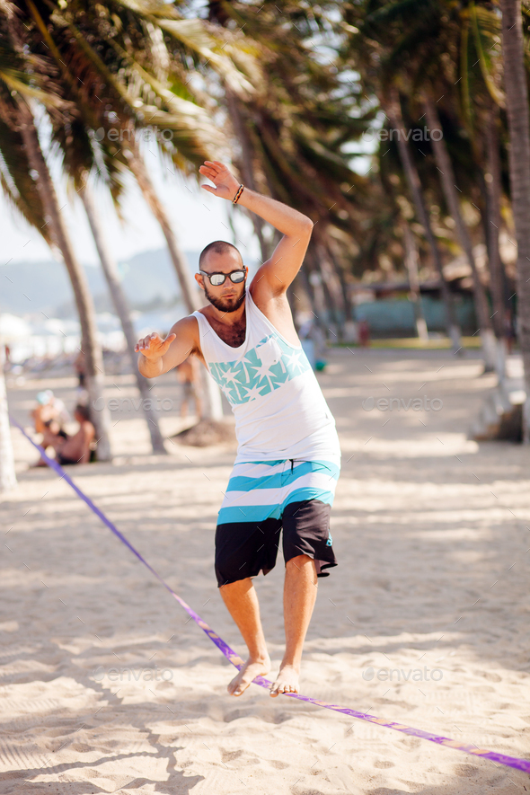 man balancing on the rope Stock Photo by avanti_photo | PhotoDune