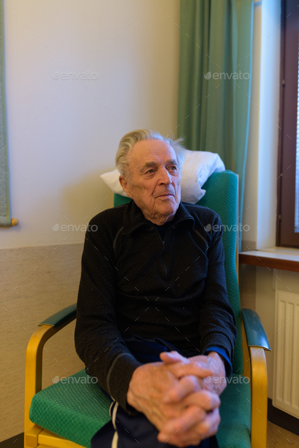 Senior man relaxing at nursing home in Turku, Finland Stock Photo by ...