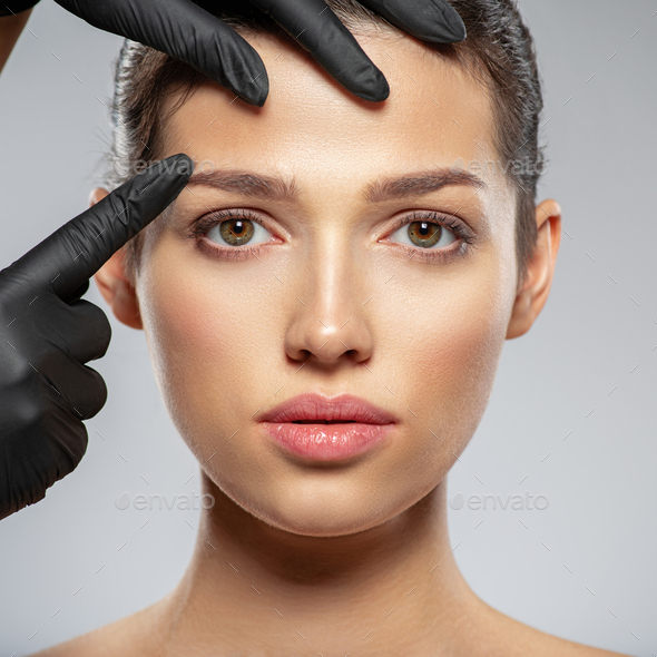 Face skin check before plastic surgery. Stock Photo by valuavitaly