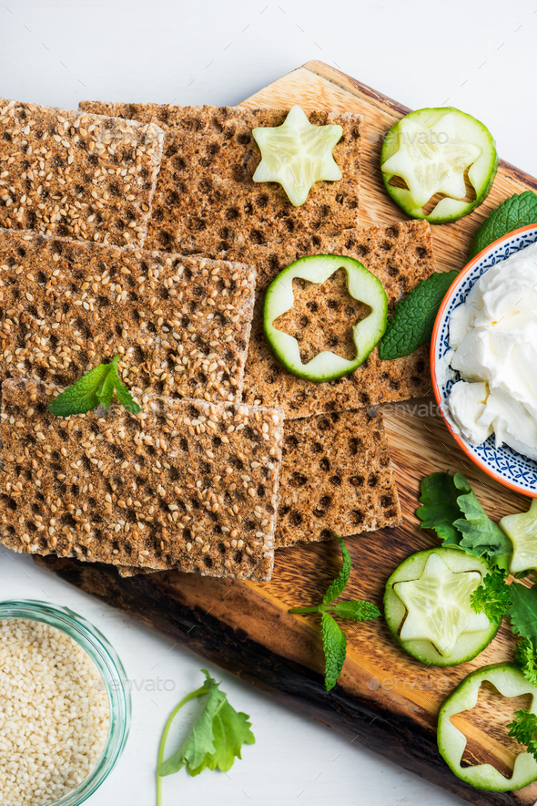 Snack from Wholegrain Rye Crispbread Crackers and Cucumber Stock Photo ...
