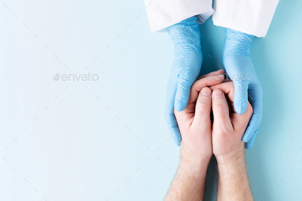 Doctor's Hands Holding Man's Hands. Stock Photo by fucsiya | PhotoDune