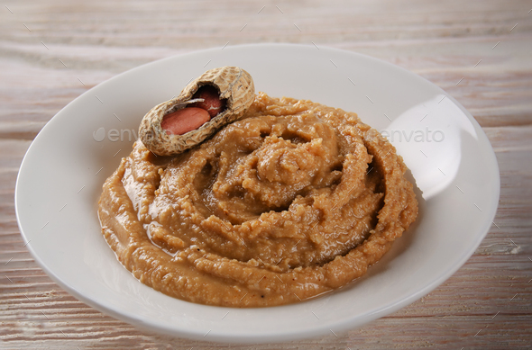 Fresh homemade peanut butter made of roasted peanuts, salt, honey and ...