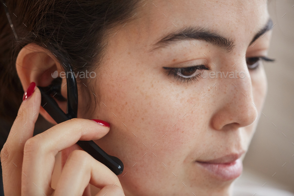 Female Operator Wearing Headset Stock Photo by seventyfourimages ...