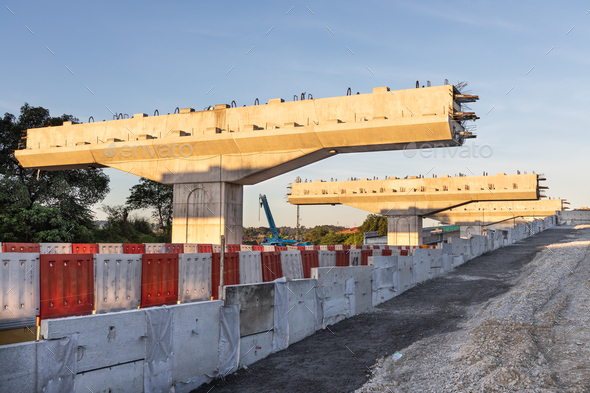 Construction of highway overpass bridge infrastructure in progress with ...