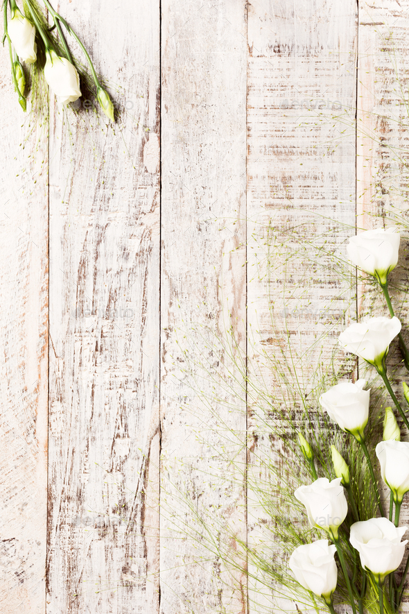 wooden background with bouquet of white flowers Stock Photo by Merinka