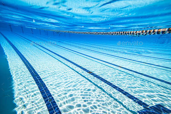 Olympic Swimming pool under water background. Stock Photo by cookelma