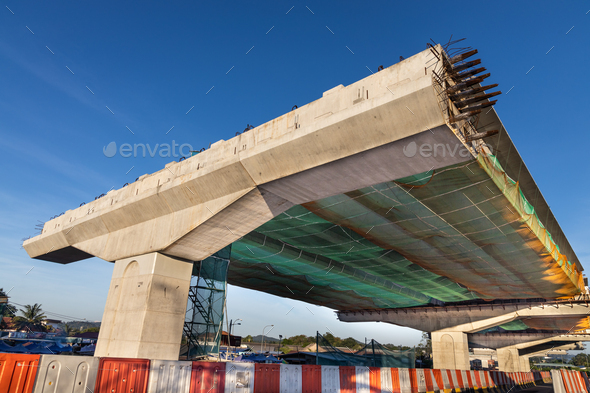 Construction of highway overpass bridge infrastructure in progress with ...