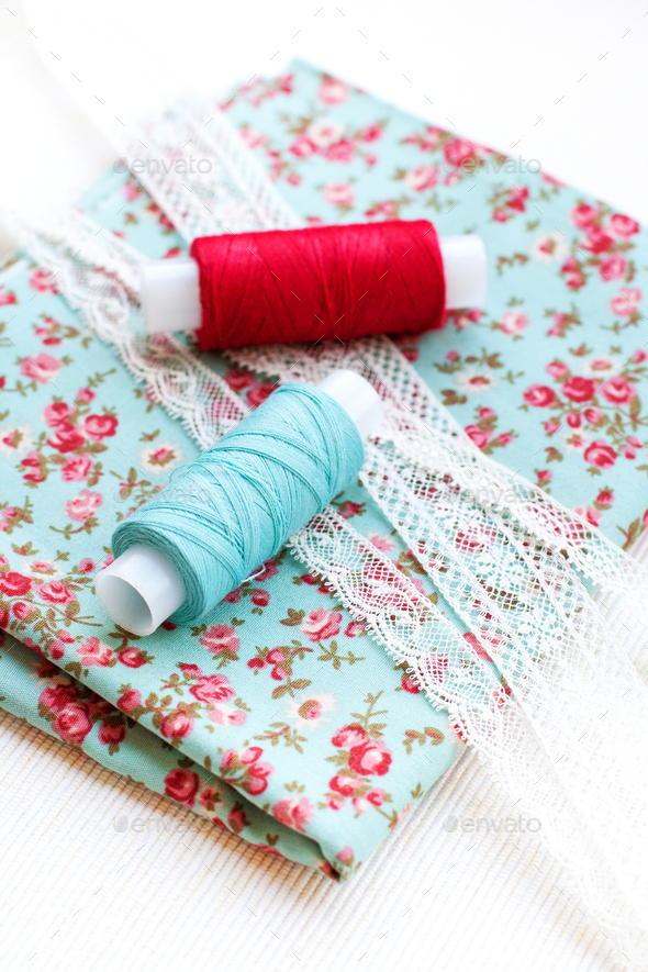 Spools of thread, lace and fabric Stock Photo by Irrin | PhotoDune