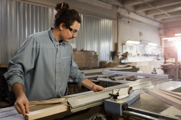 Carpenter working on lathe Stock Photo by AnnaStills | PhotoDune