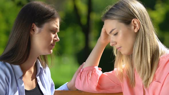 Best Friend Supporting and Comforting Sad Crying Female in Park, Trust ...