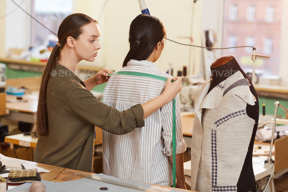 Tailor working with customer Stock Photo by AnnaStills | PhotoDune