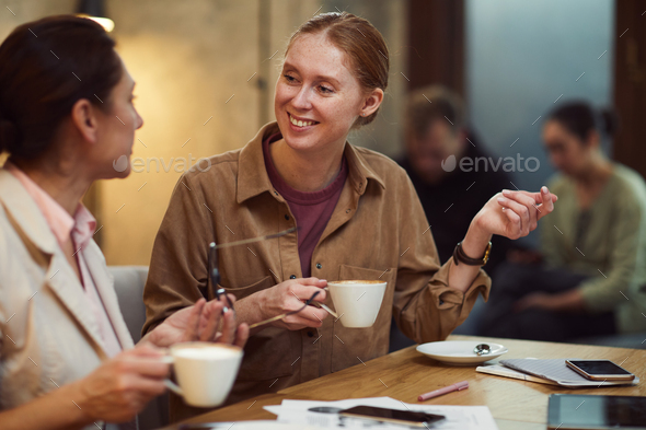 Colleagues have a coffee break in cafe Stock Photo by AnnaStills ...