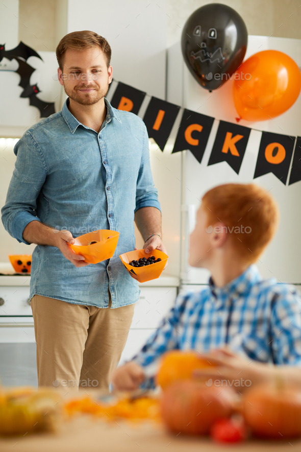 Father and son arranging party Stock Photo by AnnaStills | PhotoDune