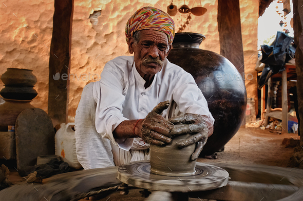 Indian potter at work. Handwork craft from Shilpagram, Udaipur ...