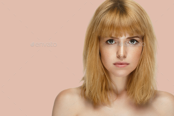 Beautiful woman face model face red hair on summer pink background ...
