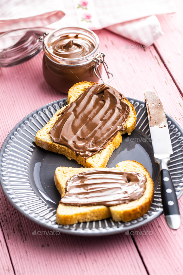 Toast bread with hazelnut spread. Sweet chocolate cream. Stock Photo by ...