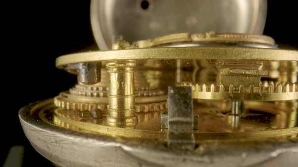 Inside View of a Moving Clockwork of Golden Mechanical Clock on Black ...