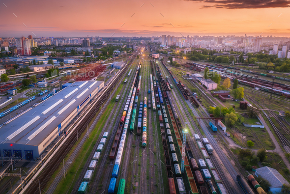 Aerial view of freight trains at sunset. Top view of railroad Stock ...