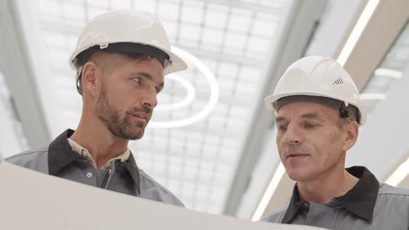 Men in Safety Helmets Talking, Stock Footage | VideoHive