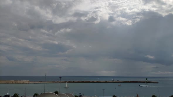 Time lapse of Barcelona's port horizon on a bright day with quite a few ...