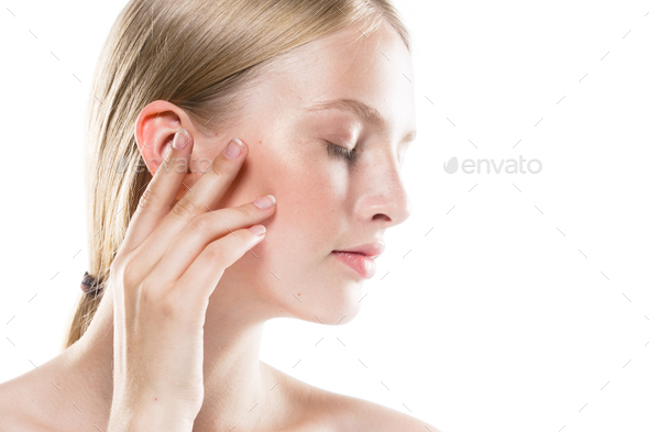 Young woman with beauty skin hand touching face isolated on white Stock ...