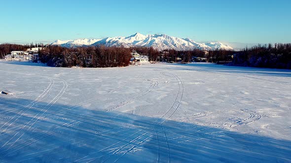 4k 30fps aerial video of ice fishing. Finger Lake. Wasilla, Alaska ...