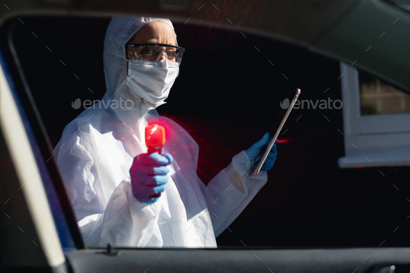 Caucasian woman wearing a lab overalls and coronvirus covid19 mask ...
