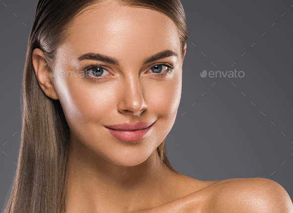 Female beautiful face eyes and smile spa concept Stock Photo by kiraliffe