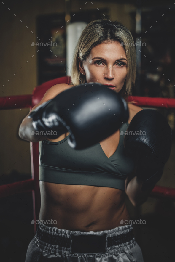 Portrait of experienced female boxer Stock Photo by fxquadro | PhotoDune