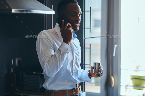 Concept of mourning routine - man has coffee at the kitchen - Stock ...