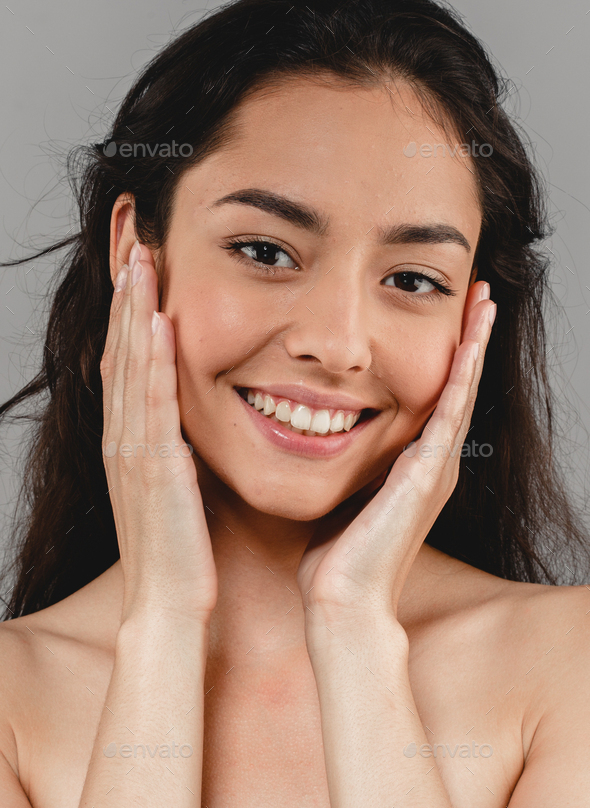 Female tan skin teeth smile macro face portrait Stock Photo by kiraliffe