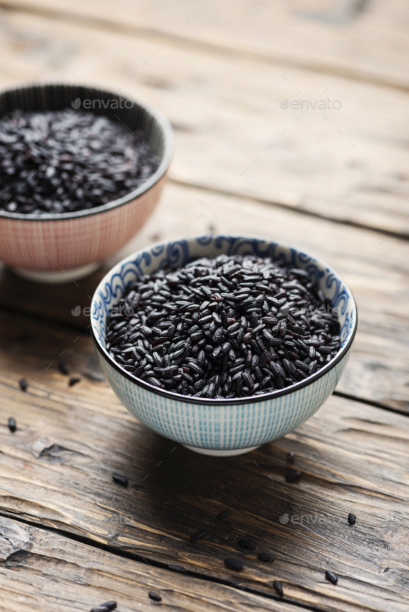 Raw black asian rice Stock Photo by OxanaDenezhkina | PhotoDune