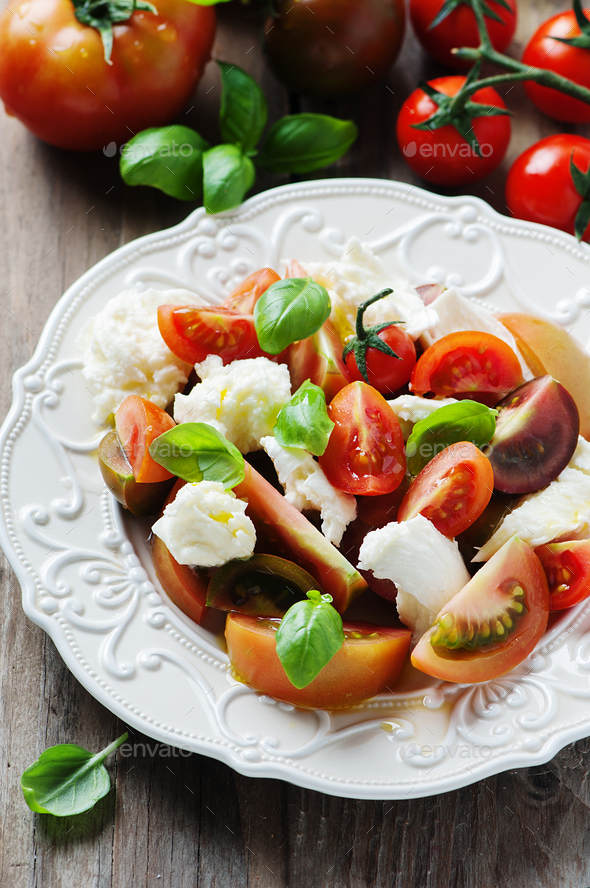 Traditional italian antipasto caprese with mozzarella Stock Photo by ...
