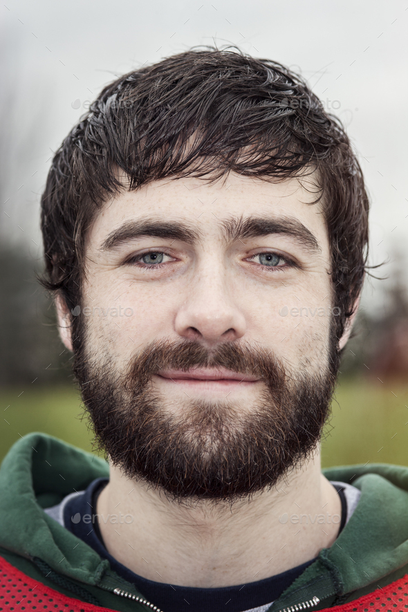 Portrait of a Caucasian man with brown hair and a beard. Stock Photo by ...