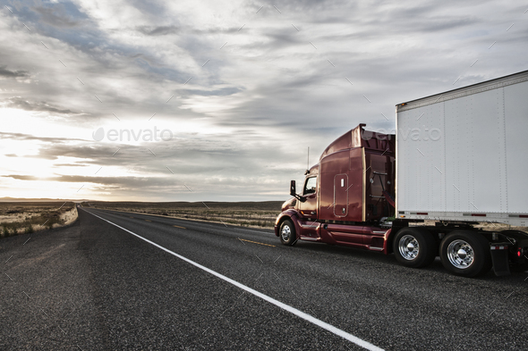 Side view of the cab of a commercial truck on the highway in eastern ...