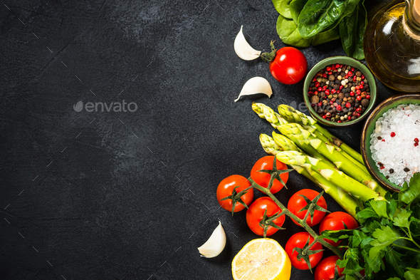 Food cooking background at black table top view Stock Photo by Nadianb
