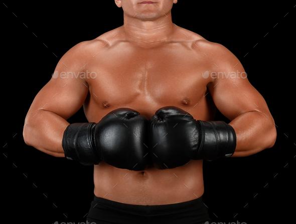 Boxer man athletic body on black background Stock Photo by kiraliffe