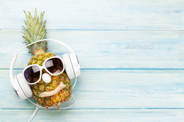 Pineapple with sunglasses and headphones Stock Photo by karandaev ...