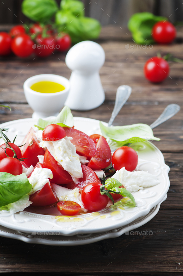 Italian salad caprese with tomato and mozzarella Stock Photo by ...