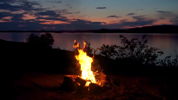 Amazing Bonfire By The Beautiful Lake In Canada On A Cold Evening With ...