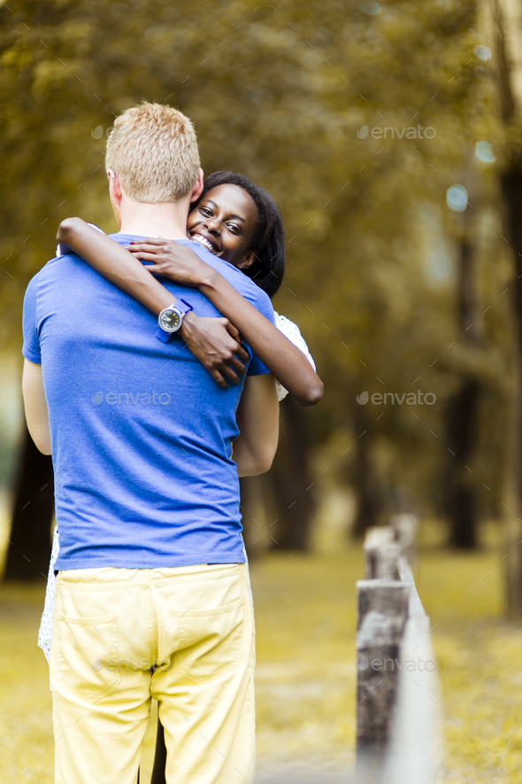 Couple in love hugging peacfully outdoors Stock Photo by nd3000 | PhotoDune