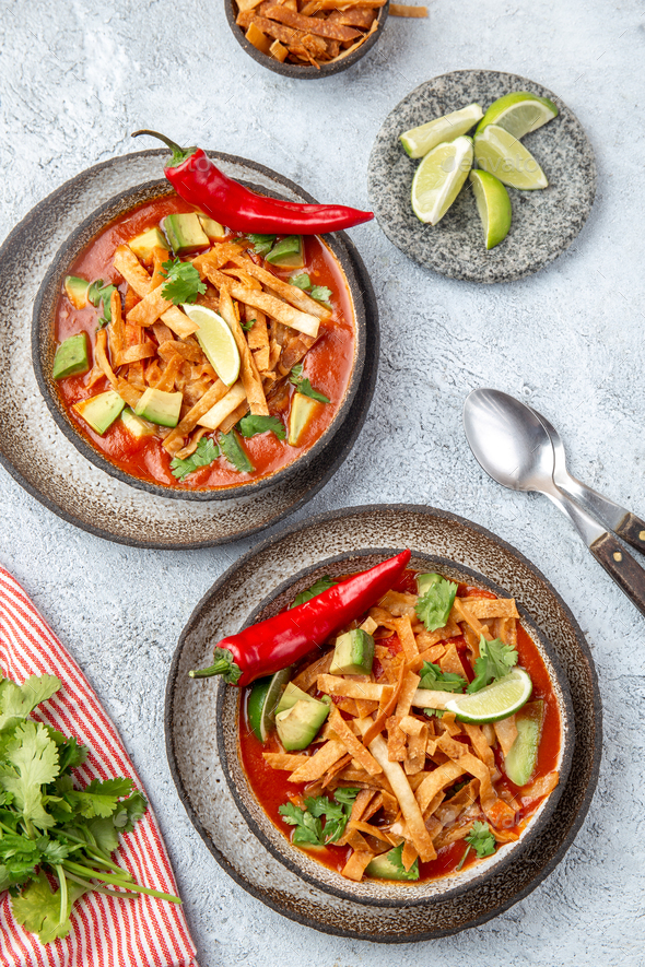Aztec soup. Mexican sopa azteca with fried tortilla . Top view Stock ...