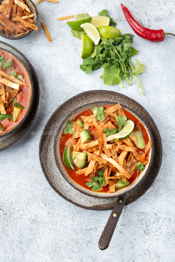Aztec soup. Mexican sopa azteca with fried tortilla . Top view Stock ...