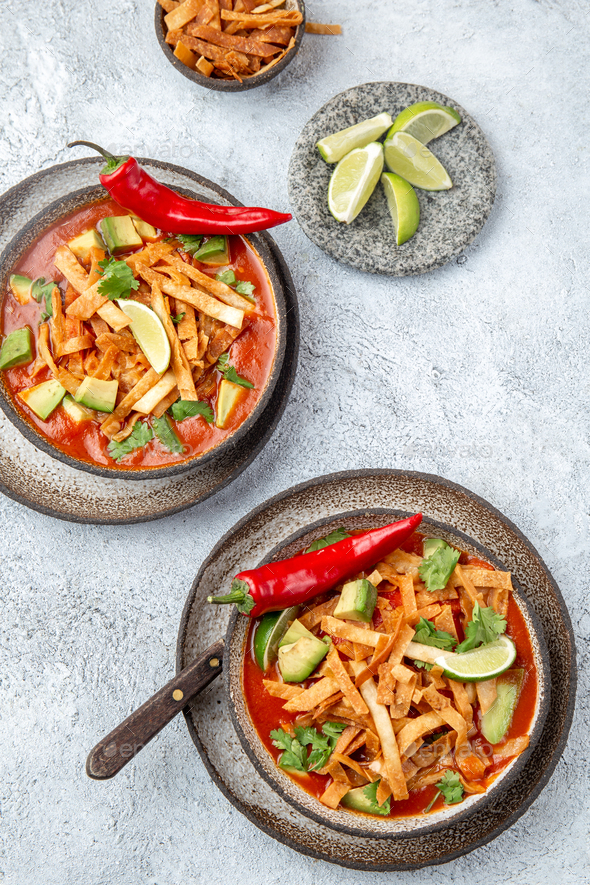 Aztec soup. Mexican sopa azteca with fried tortilla . Top view Stock ...