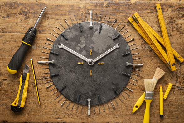 Tool watch with screws , brushes, meter, screwdriver on a vintage ...